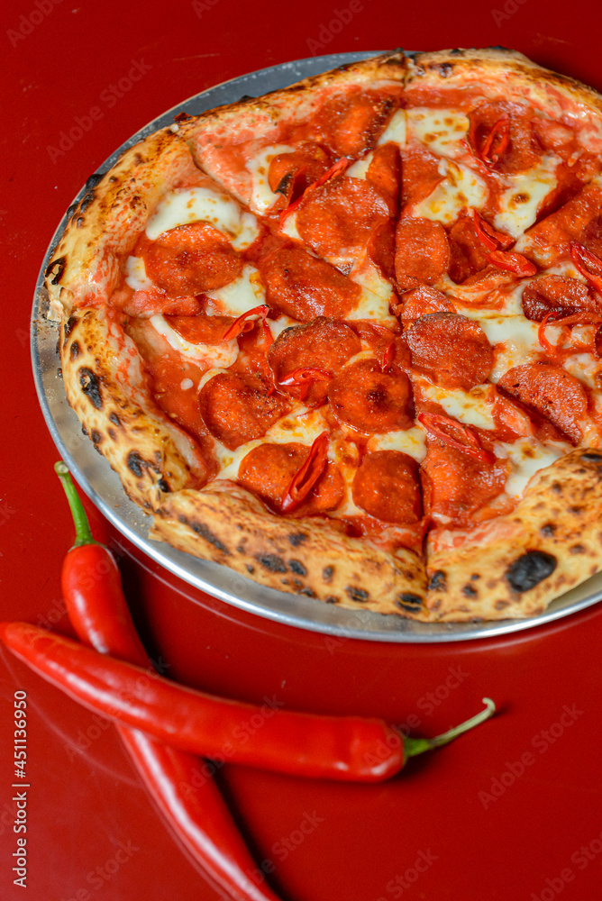 Hot Chilli Pepperoni Pizza, ready to eat. Whole sliced pepperoni salami ...