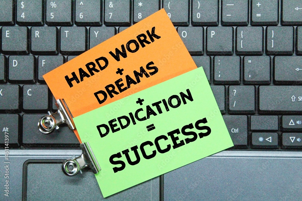 laptop keyboard, color paper with quote ideas, quotes, words ...