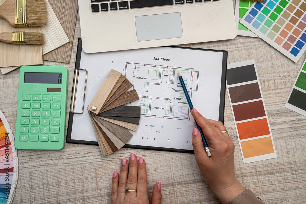 Interior designer's hand selects a color from the palette Stock Photo ...