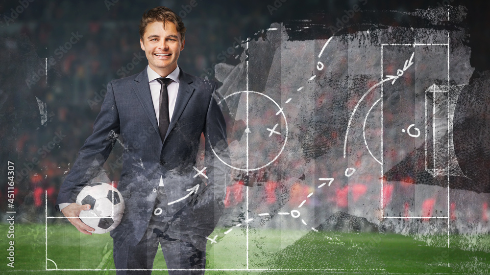 smiling businessman in formal wear with soccer ball in the big stage ...