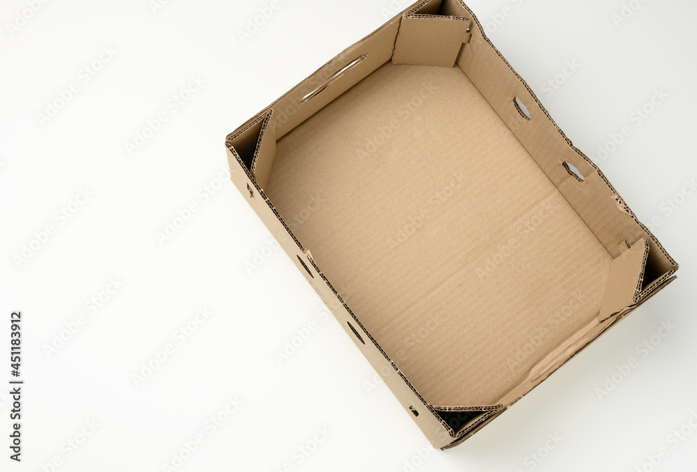 rectangular empty cardboard box of brown paper on a white background ...