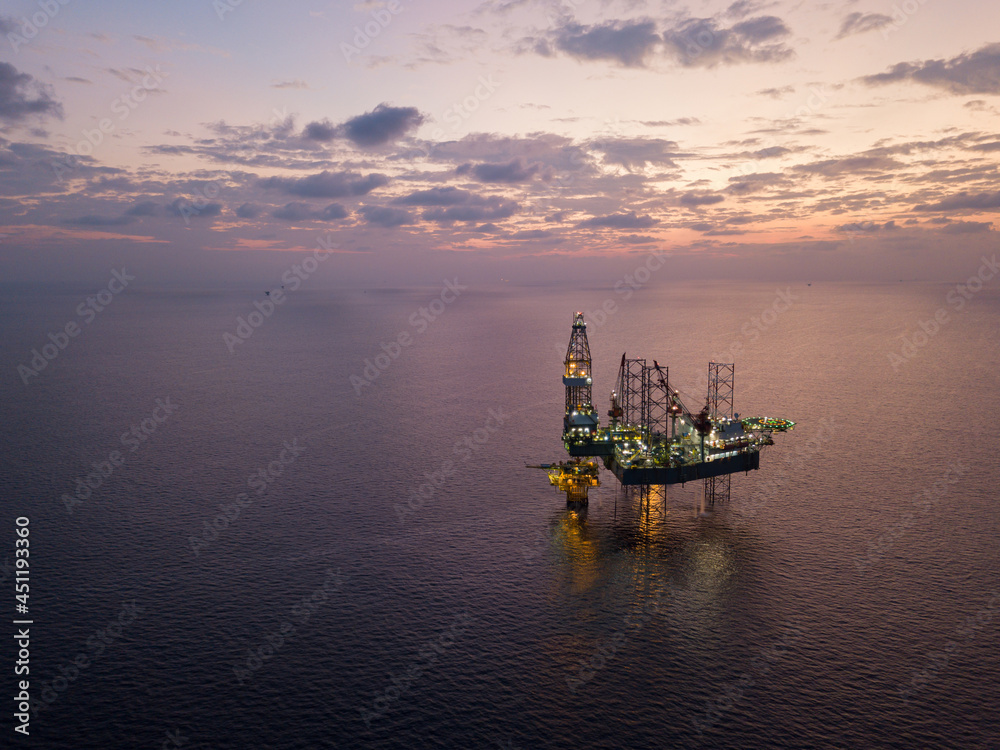 Offshore Jack Up Rig in The Middle of The Sea at Sunset Time for ...