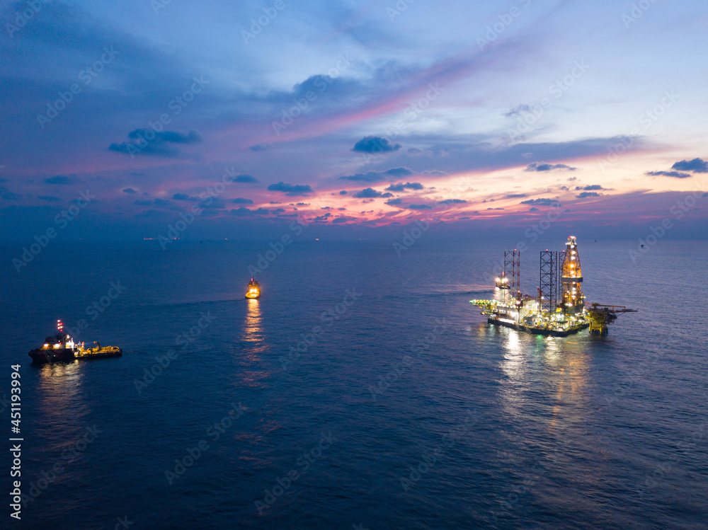Offshore Jack Up Rig in The Middle of The Sea at Sunset Time for ...