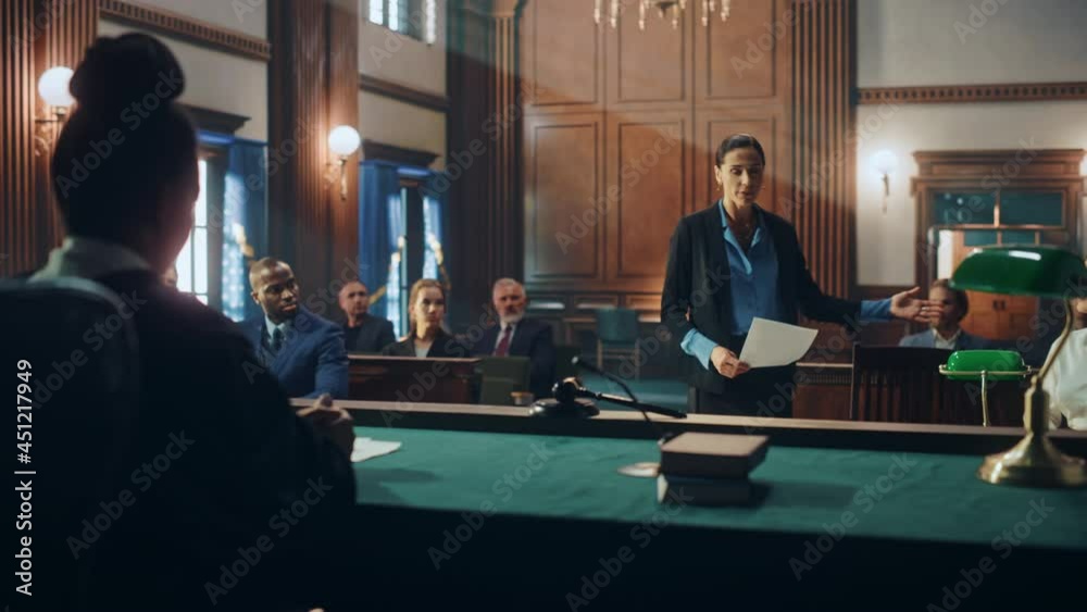 Court of Justice and Law Trial: Female Public Defender Presenting Case ...