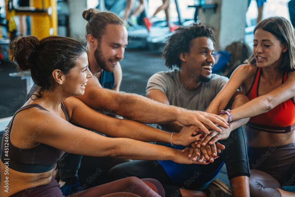 Beautiful fit people working out in gym together Stock Photo | Adobe Stock