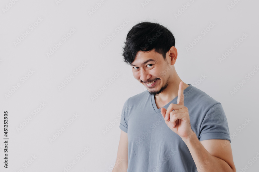 Funny Asian man is whispering some secret gossip isolated on white ...