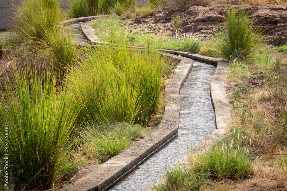 The traditional falaj irrigation system in the mountain village of Al ...