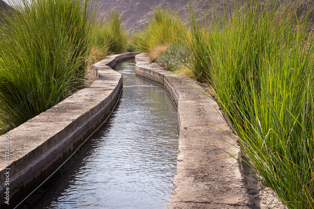 The traditional falaj irrigation system in the mountain village of Al ...