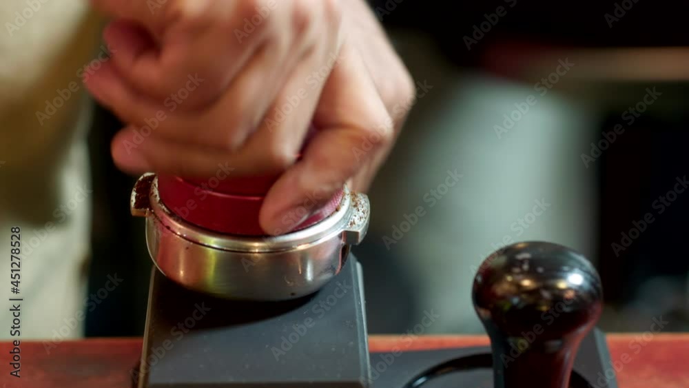 ground coffee being compacted Stock Video | Adobe Stock