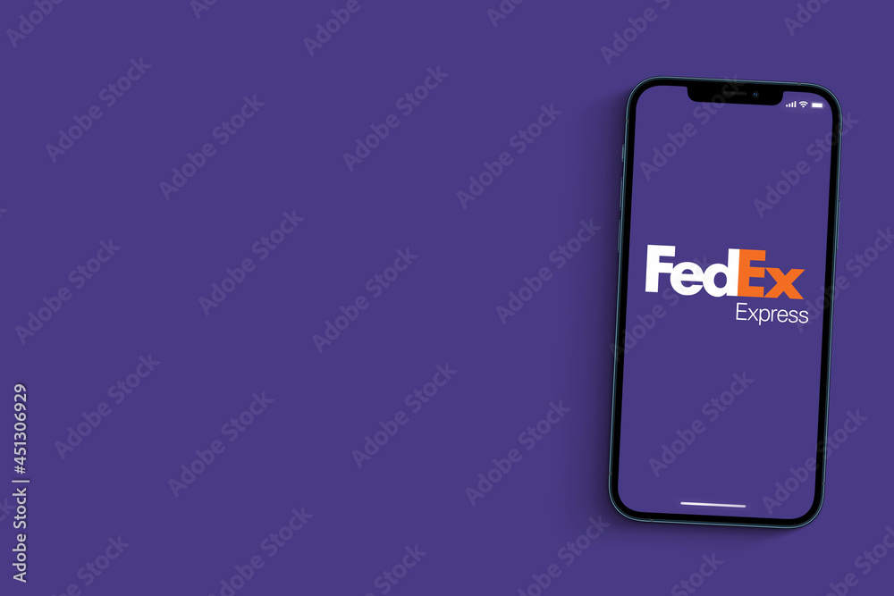Fedex Express app on smartphone screen on purple background. Express ...