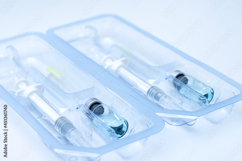 Covid-19, flu, coronavirus liquid vaccine vial bottle and syringe set ...