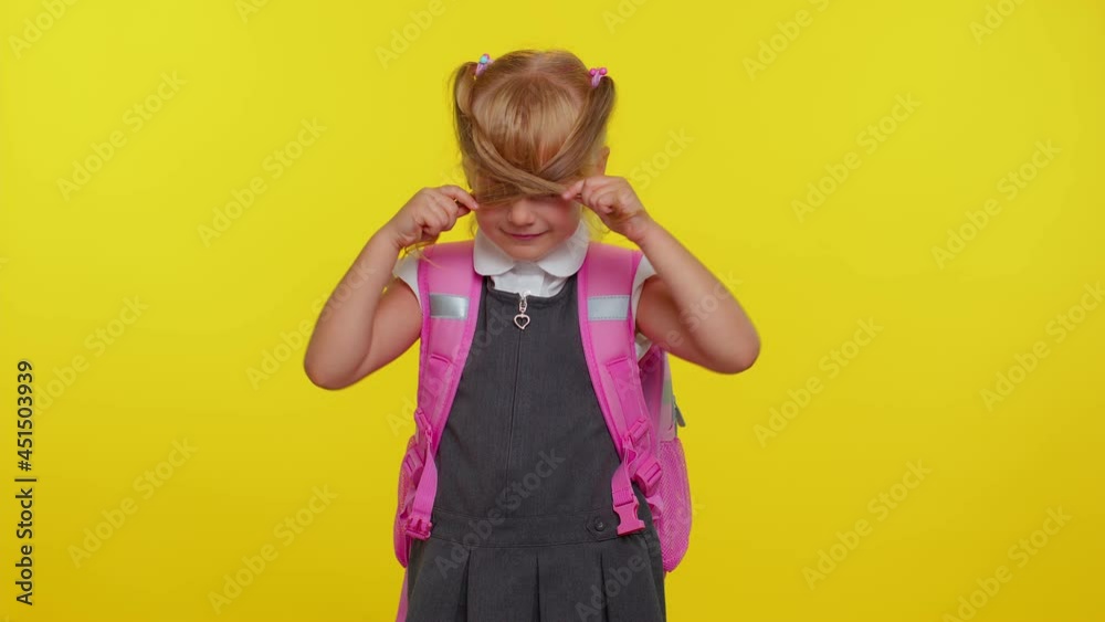 Vidéo Stock Funny school girl with backpack play with pony tails laugh ...