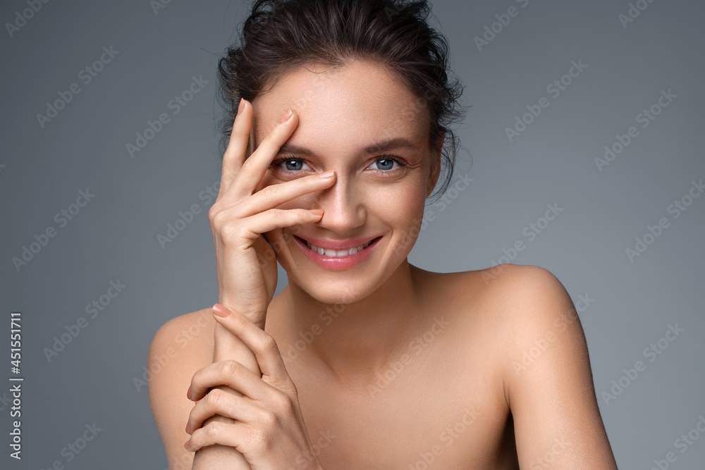 Beautiful woman with perfect skin on gray background. Beauty and skin ...