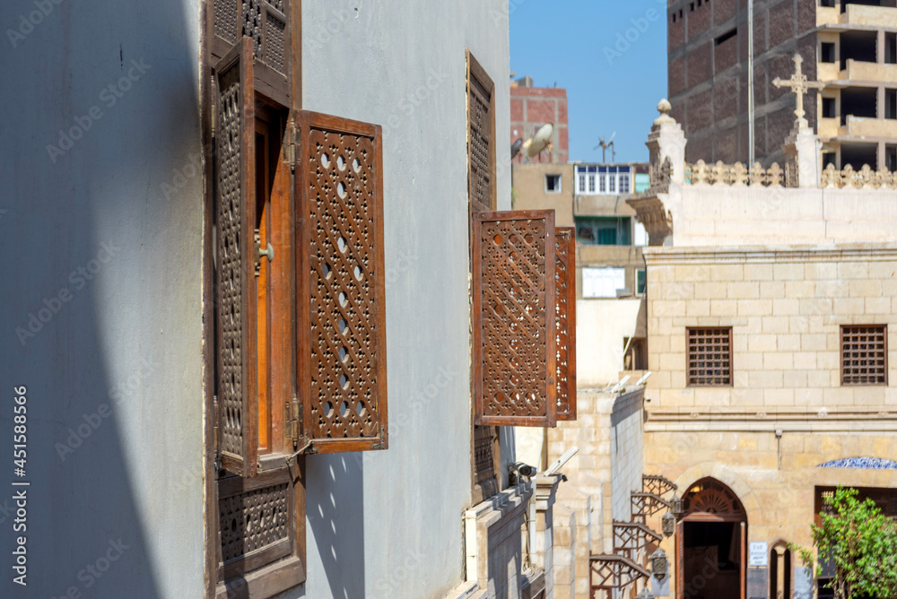 The shutters on windows on facae of the famous Coptic Hanging Church ...