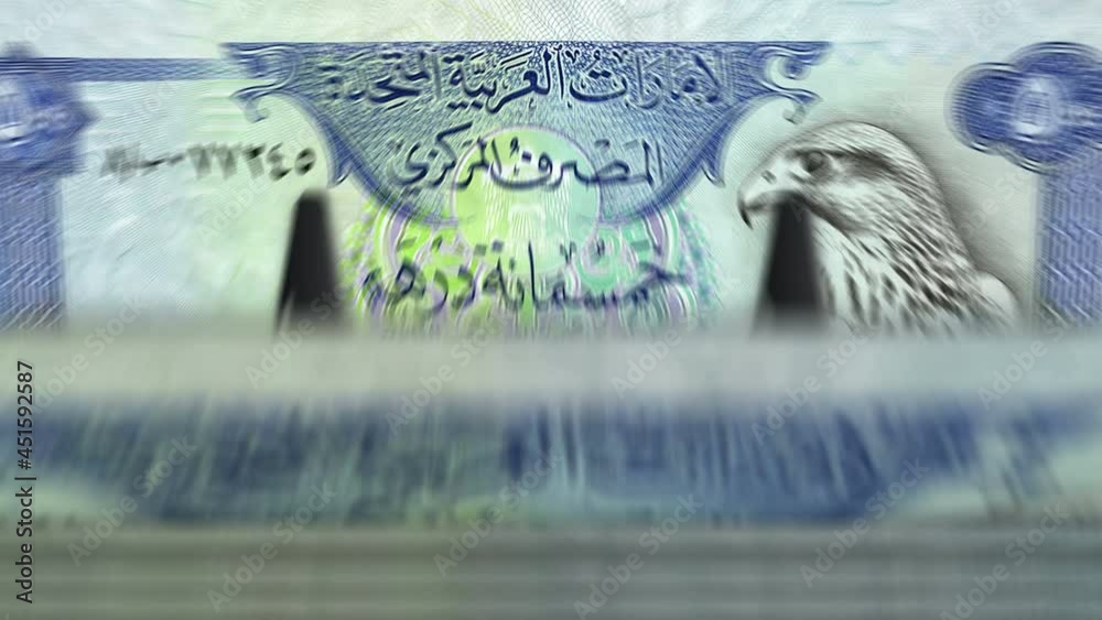 Arab Emirates Dirhams money counting machine with banknotes. Quick 500 ...