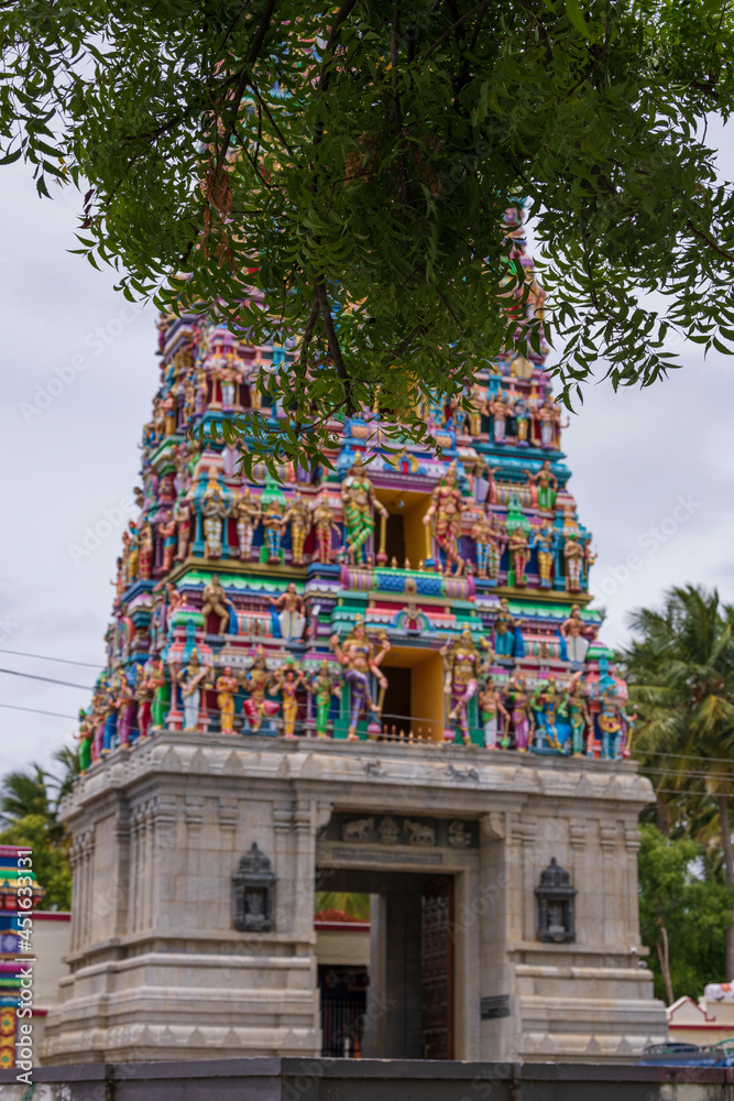 Temple tower in close up with full architecture details. Multi colour ...