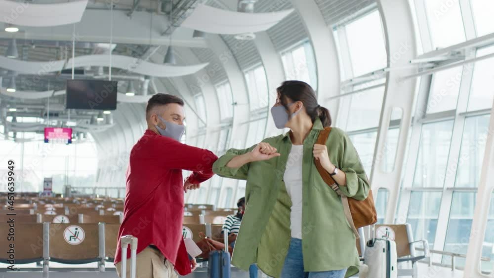 Stockvideo New normal greeting concepts. Two young people say hi to ...