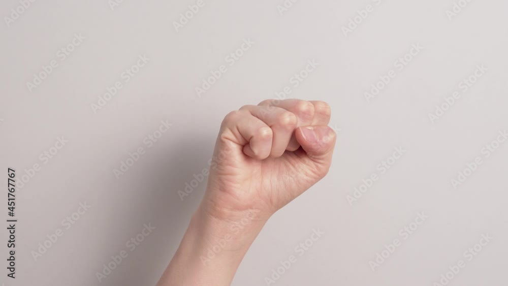 Female Hand Showing Letter S In American Sign Language. close up Stock ...