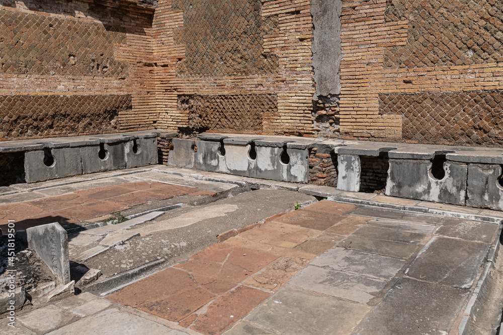 Latrina presso le terme del foro. Ancient public toilets (latrines ...