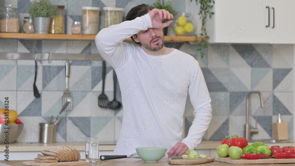 Poster Healthy Young Man Feeling Tired while Cooking in Kitchen – Wall ...