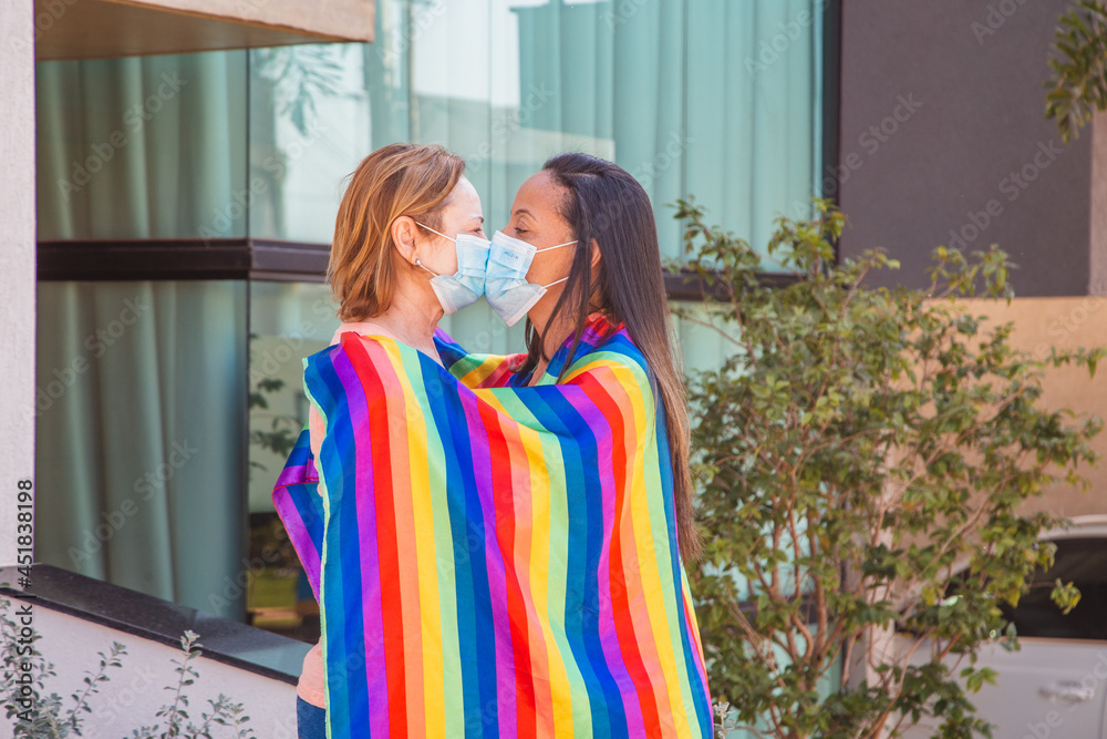 Smiling lesbian couple on outdoor background. Passionate lesbian couple ...