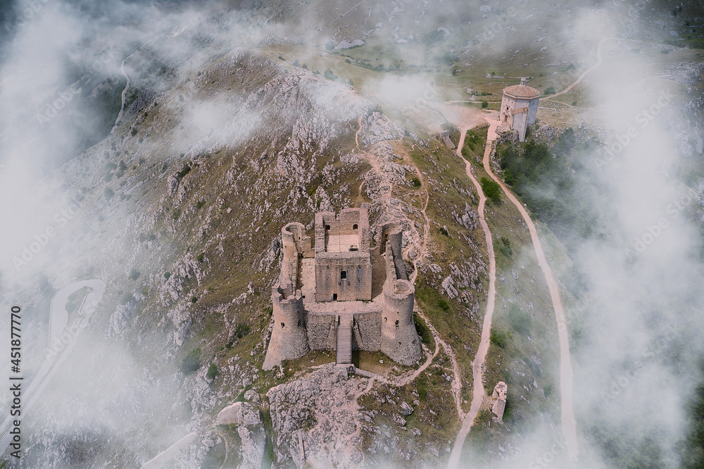 aerial view of the medieval castle of rocca calascio and church of ...