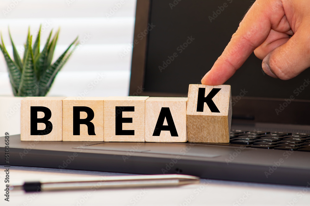 word break written with wood cubes on black background. Bird view Stock ...