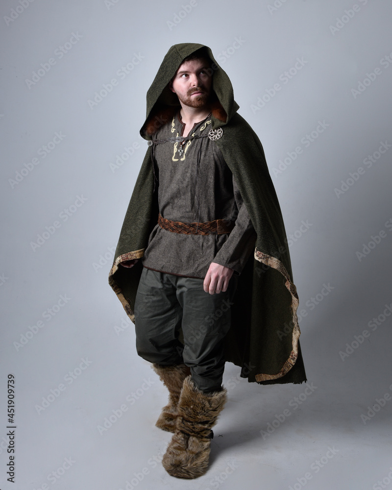 Full length portrait of young handsome man wearing medieval Celtic ...