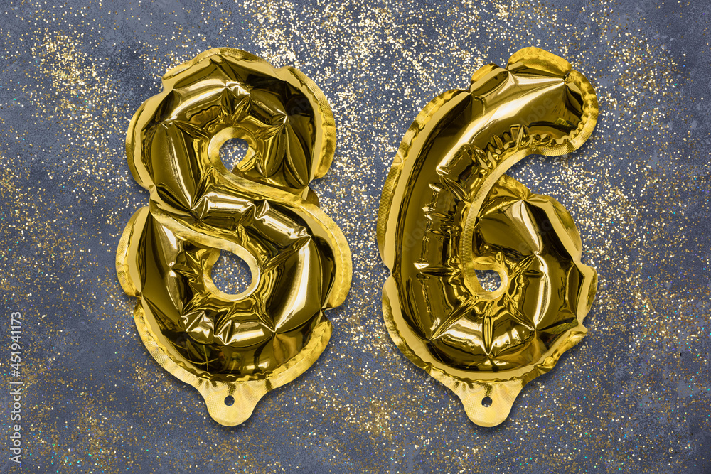 The number of the balloon made of golden foil, the number eighty-six on ...