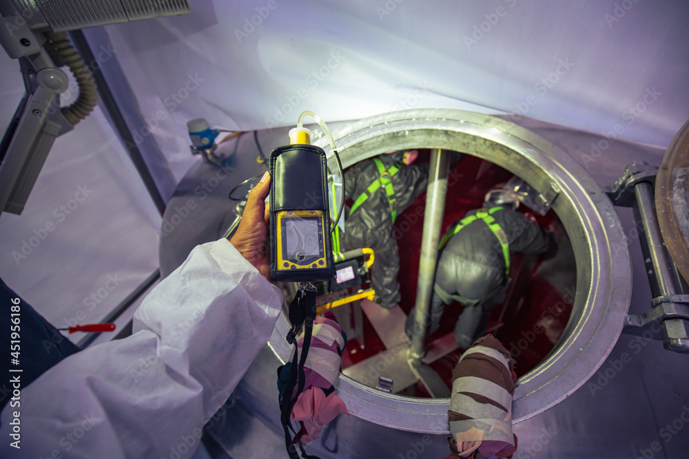 Poster Worker hand holding gas detector inspection safety gas testing ...