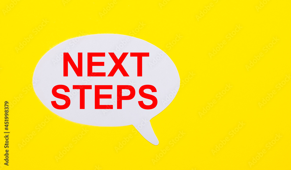 On a bright yellow background, white paper with the words NEXT STEPS ...