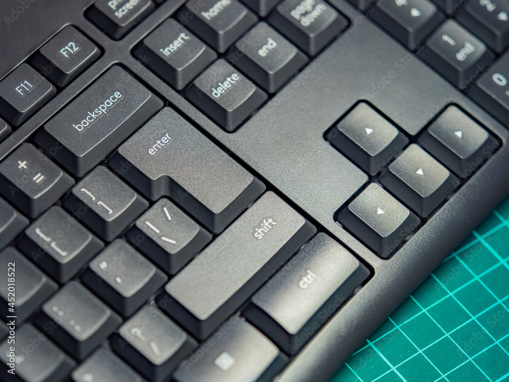 Black keyboard close-up. Control and movement keys on the pc. Backspace ...