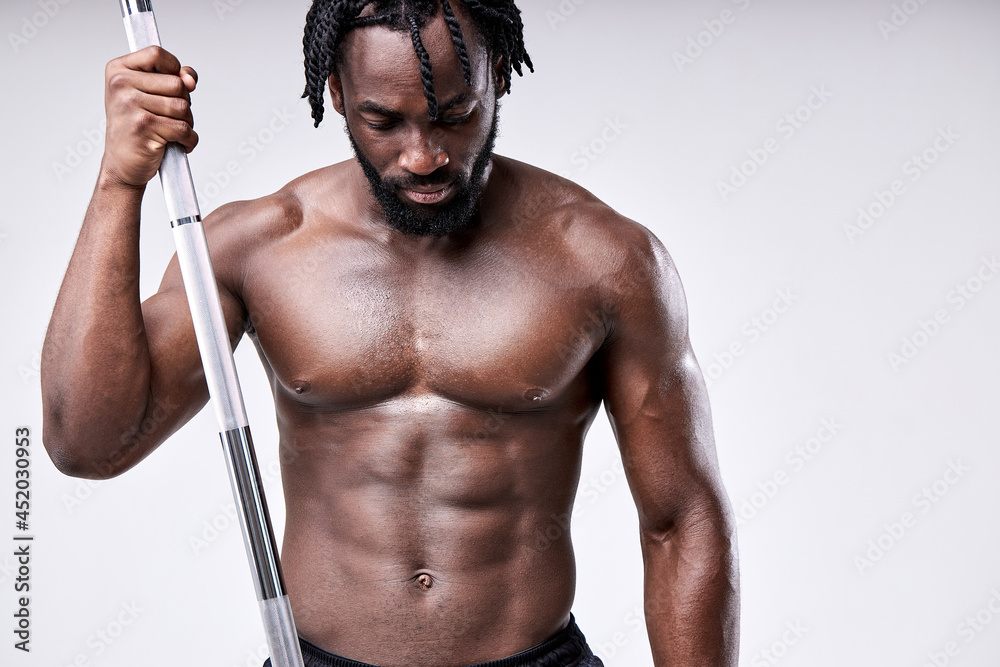 portrait of nice attractive strong black guy working out cross fit ...