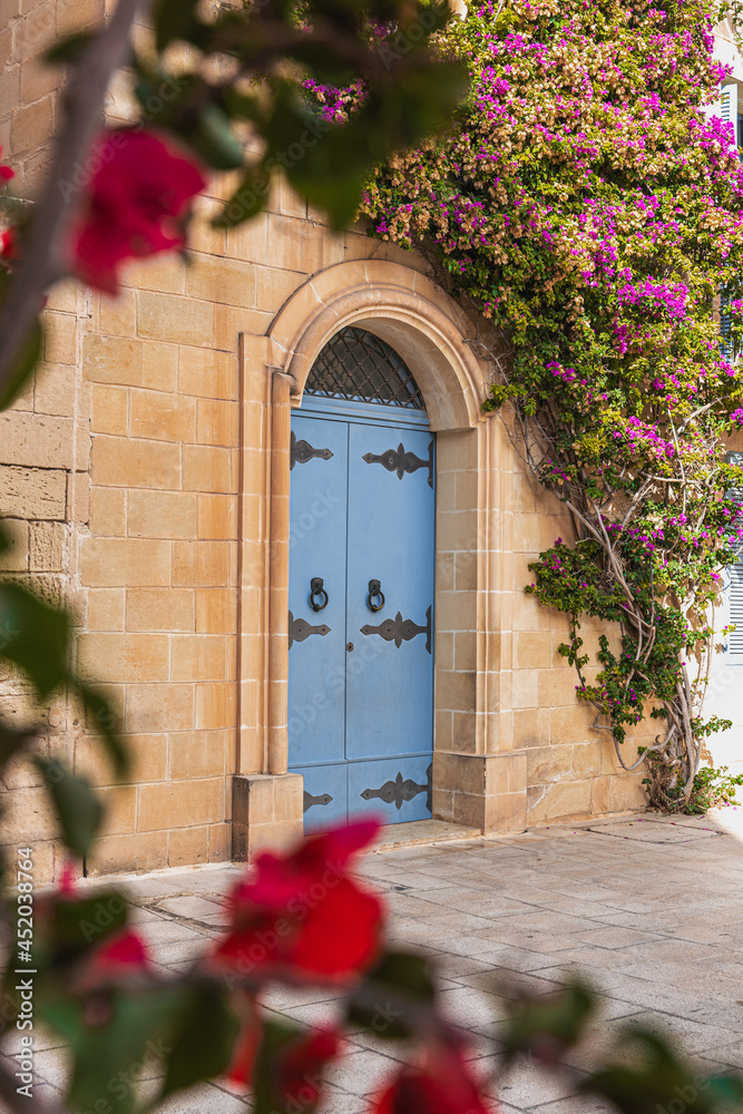 Mdina, Malta: traditional Maltese house with colorful doors, purple ...