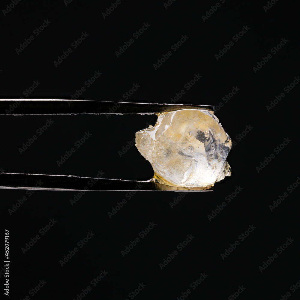 Live Resin Diamonds Cannabis Concentrates with tweezers Stock Photo ...