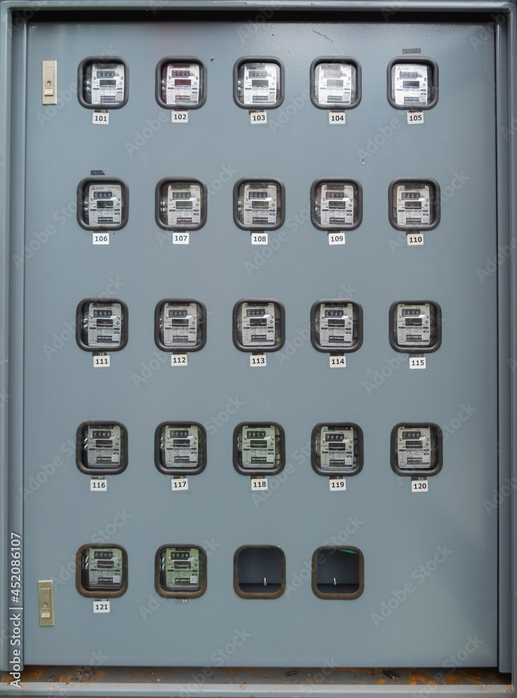 Electrical control meter panel board with number showing. Power plug of ...