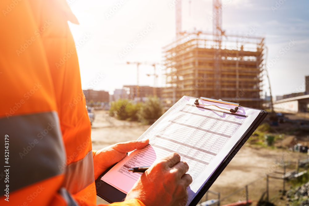 OSHA Inspection Worker At Construction Site Stock Photo | Adobe Stock