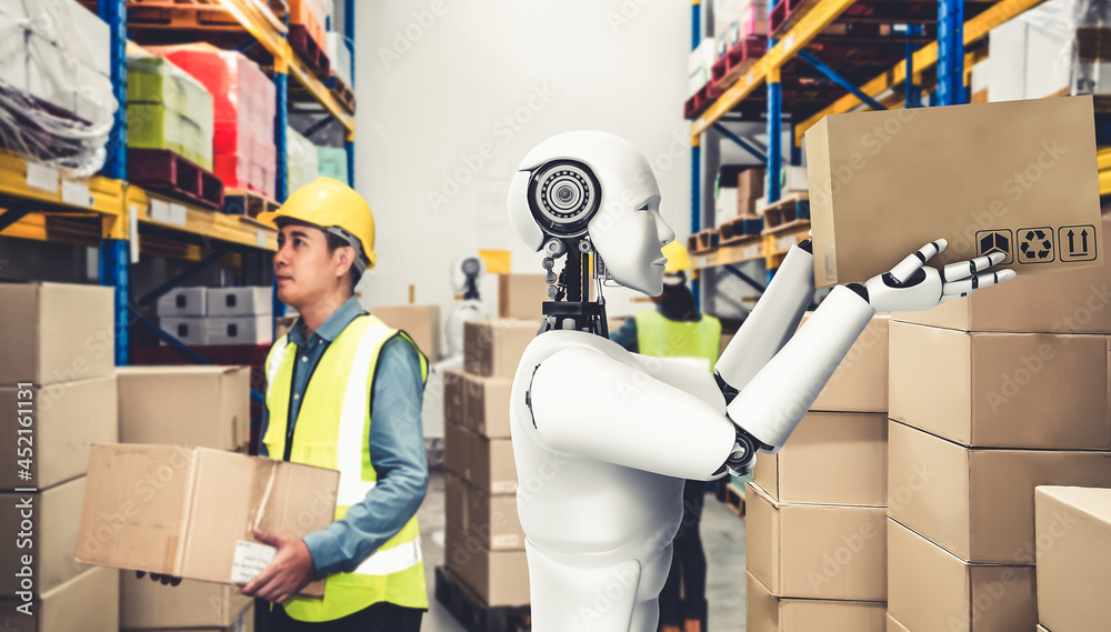 Innovative industry robot working in warehouse together with human ...