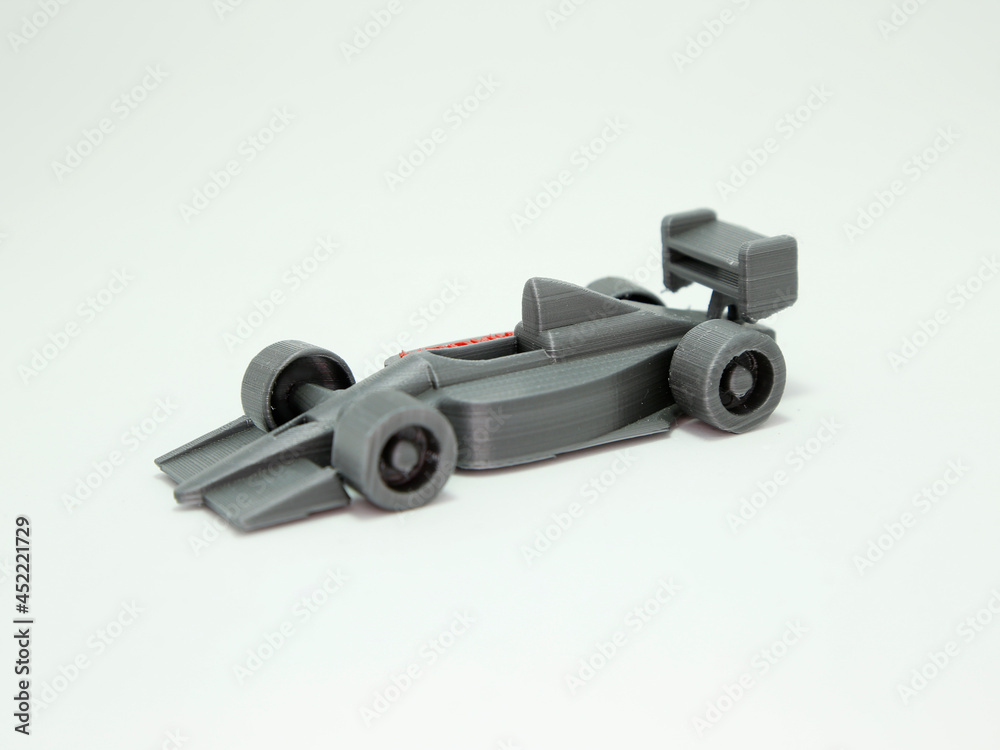 Model made in 3D printer. Formula 1 toy race car. Auto 3D printed ...