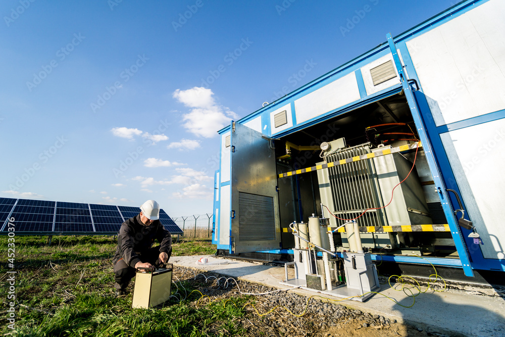 Execution of electrical measuring works on the power transformer Stock ...