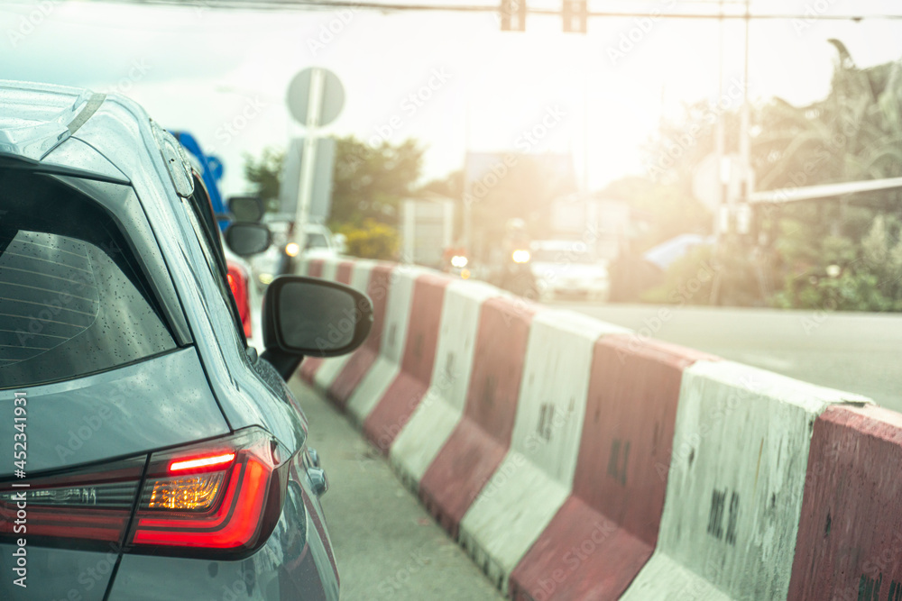 Rear side of car driving on the asphalt road in the city. Waiting in ...