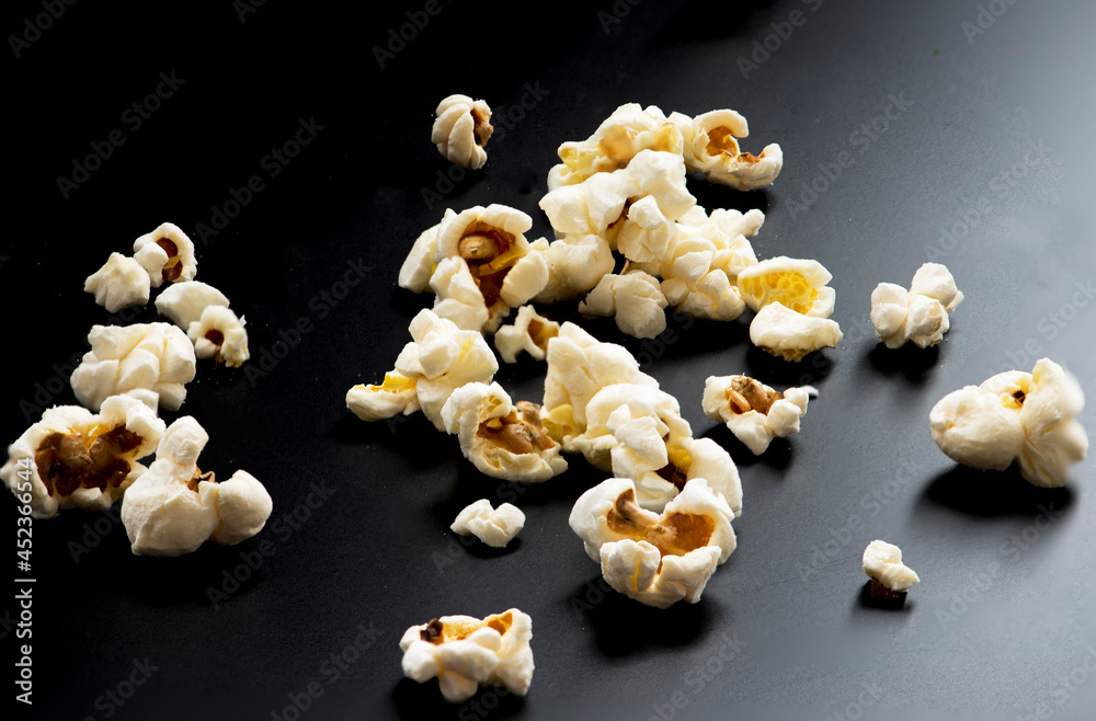 Raw corn and popcorn, ready to serve and eat Stock Photo | Adobe Stock
