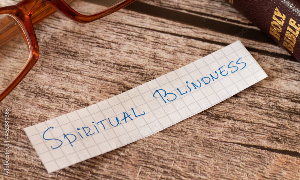 Spiritual blindness. A closeup of a handwritten quote on wooden ...