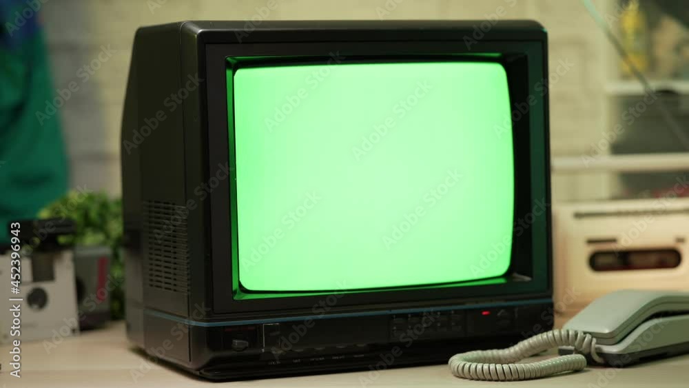 80s 90s Retro CRT TV With a Green Screen Stock Video | Adobe Stock