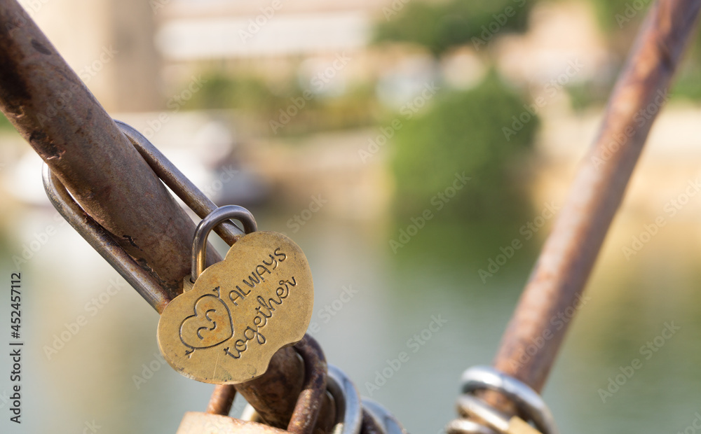 Heart-shaped love padlock with the message "Always together" in English ...