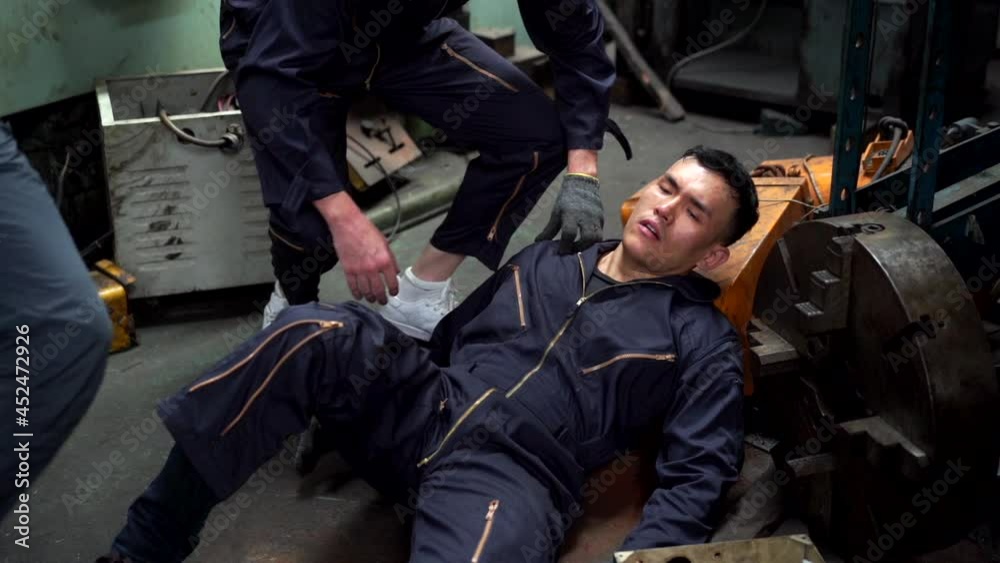 4K Asian man worker had accident unconscious on the floor at production ...