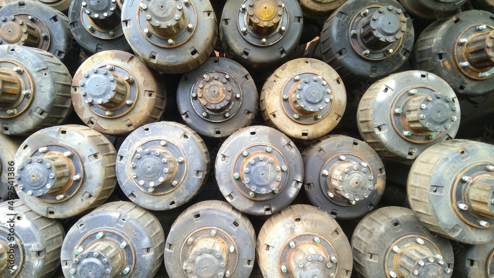 pile of used truck wheels Stock Photo | Adobe Stock