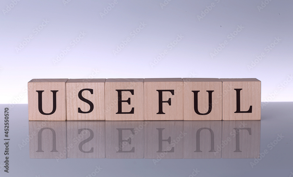 USEFUL concept, wooden word block on the grey background Stock Photo ...