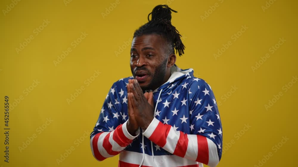 Dazed amazed African American man looking aside with surprised facial ...