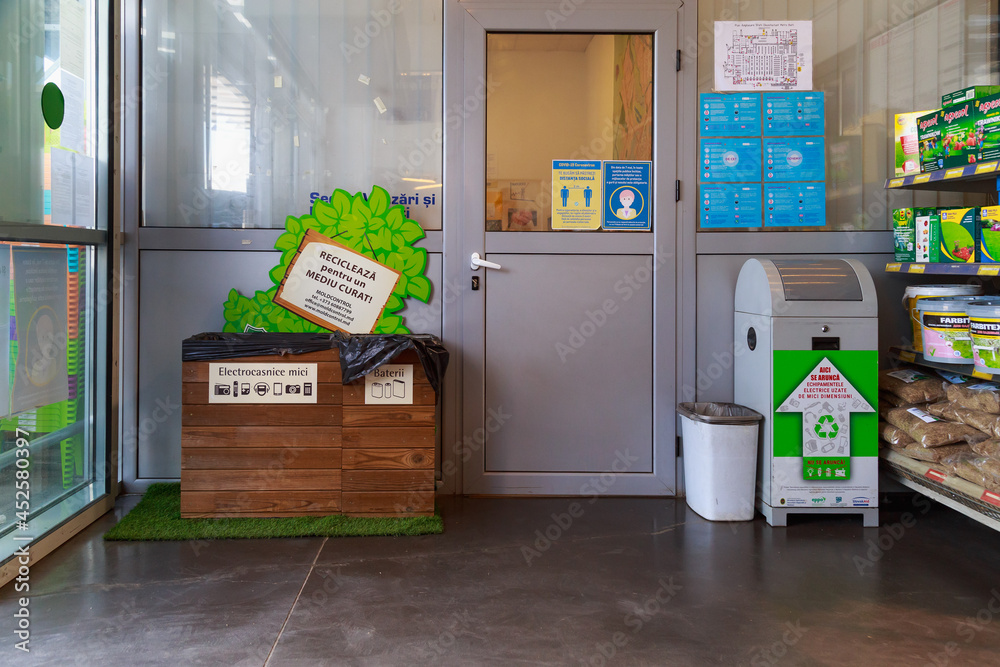 Trash can for separate collection of waste in a modern store ...